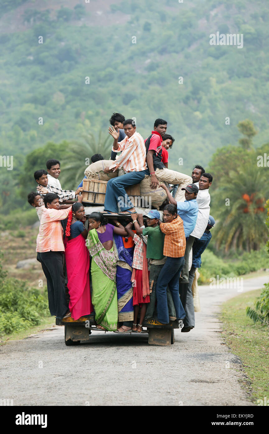 Overloaded jeep used as public transport winding its way through the ...