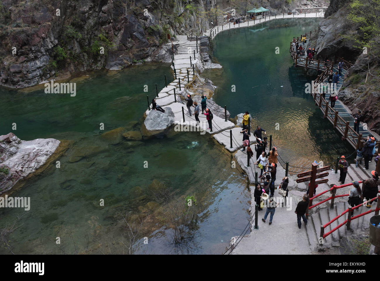 Zhengzhou. 14th Apr, 2015. Visitors enjoy the natural scenery of ...