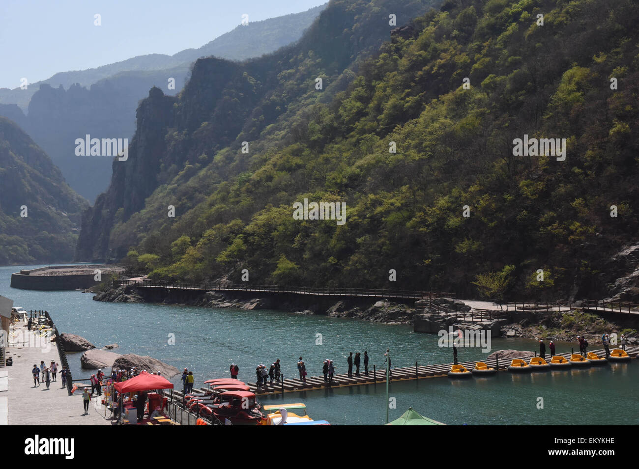 Zhengzhou. 14th Apr, 2015. Visitors enjoy the natural scenery of ...