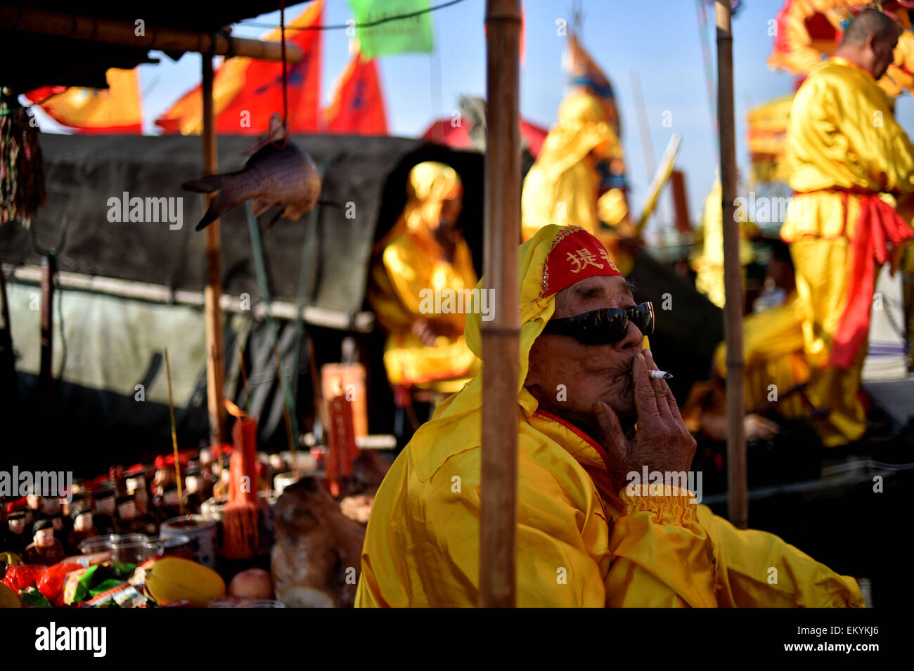 Jiaxing, China. 15th Apr, 2015. Local people attends traditional water ...