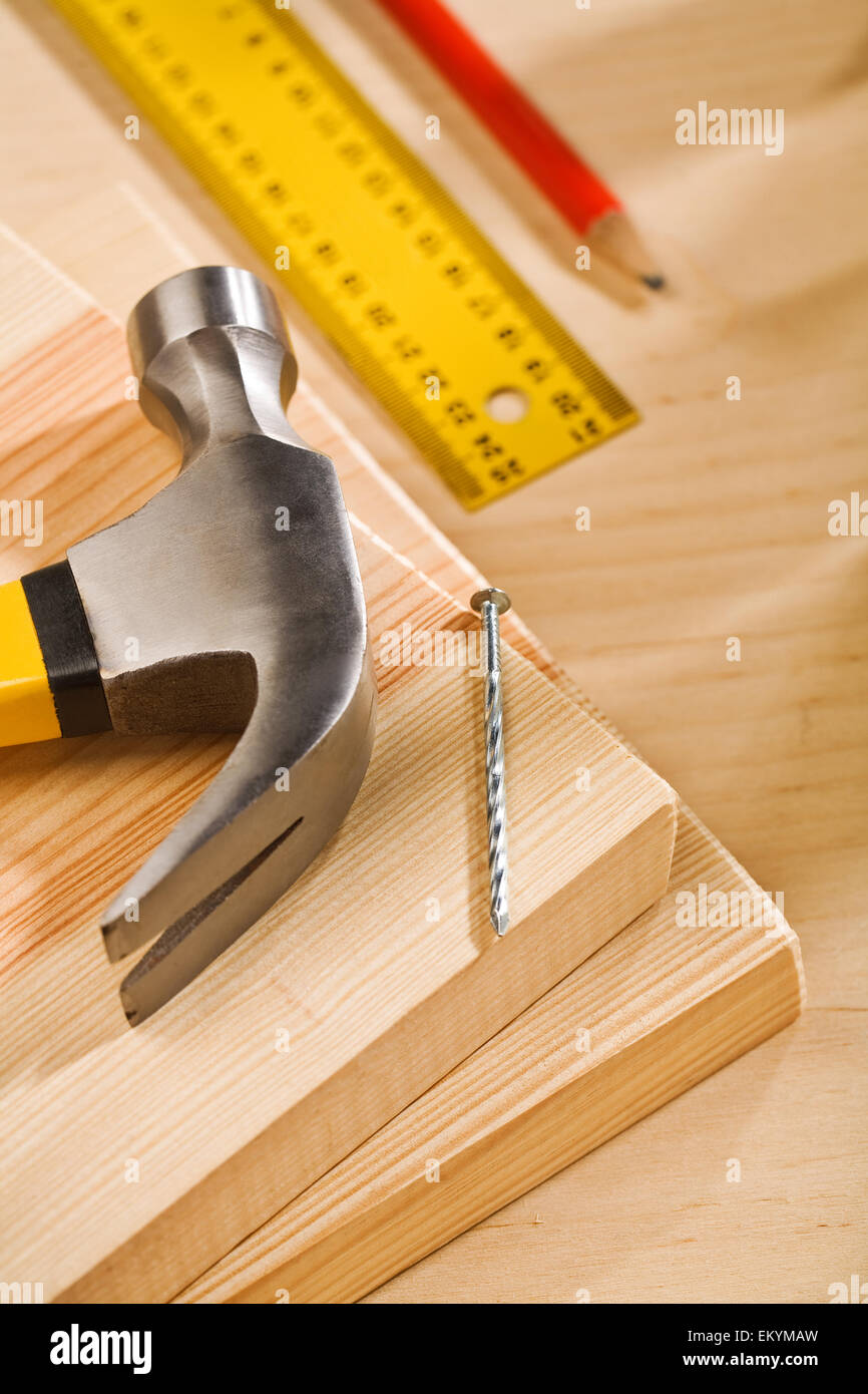 hammer nail and ruler with pencil Stock Photo - Alamy
