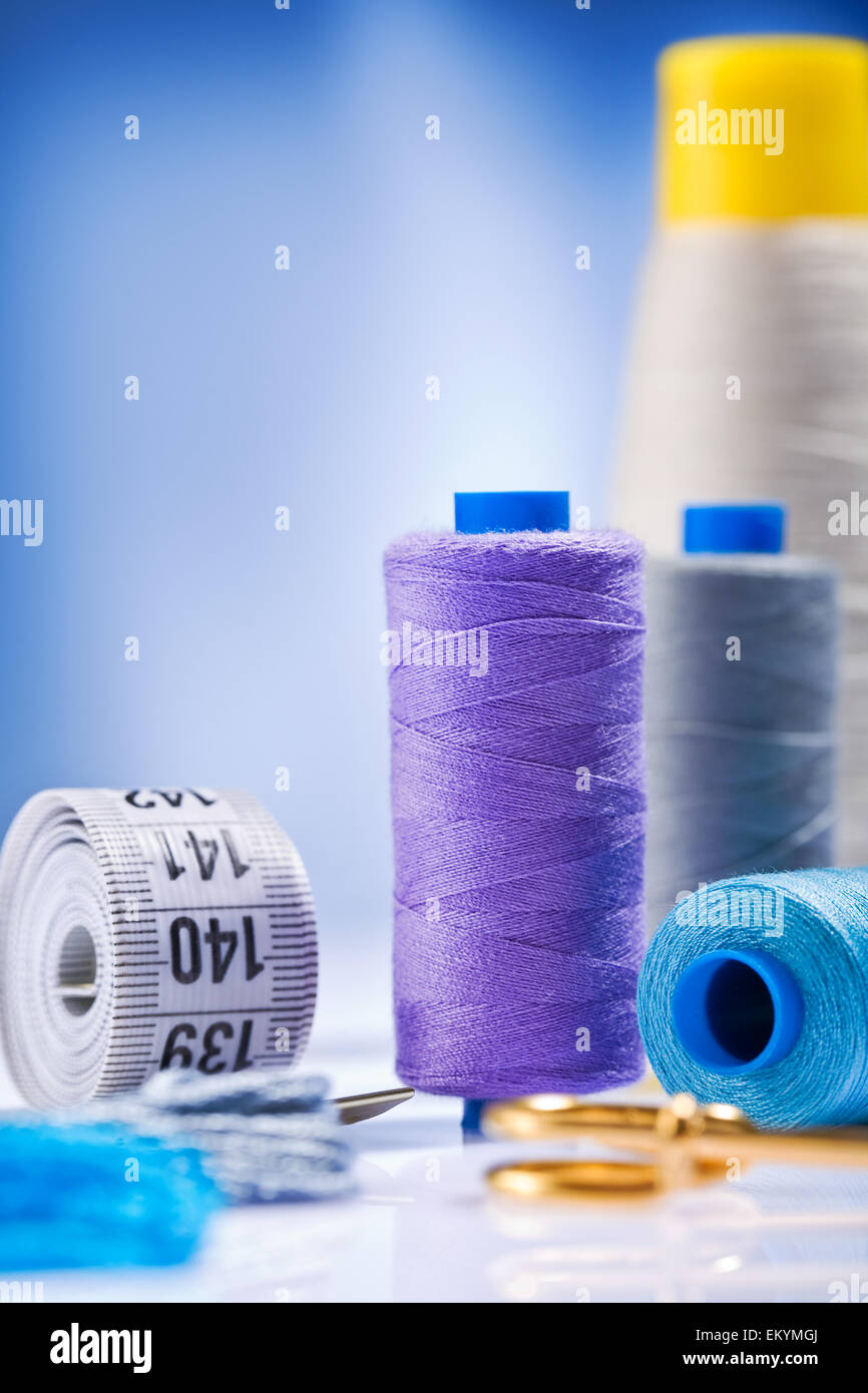 sewing spools with threads and other items Stock Photo - Alamy