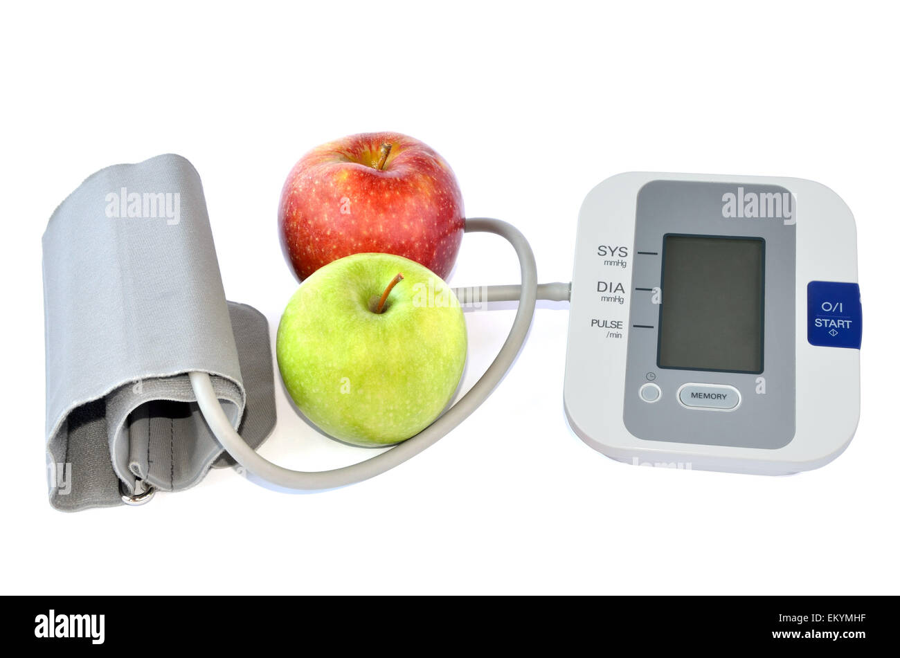Two apples and blood pressure monitor Stock Photo - Alamy