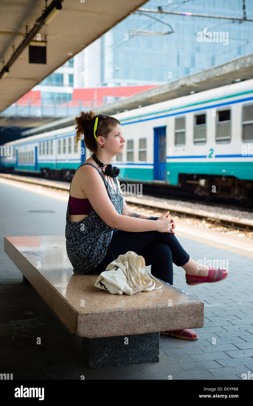 beautiful stylish modern young woman waiting train Stock Photo - Alamy