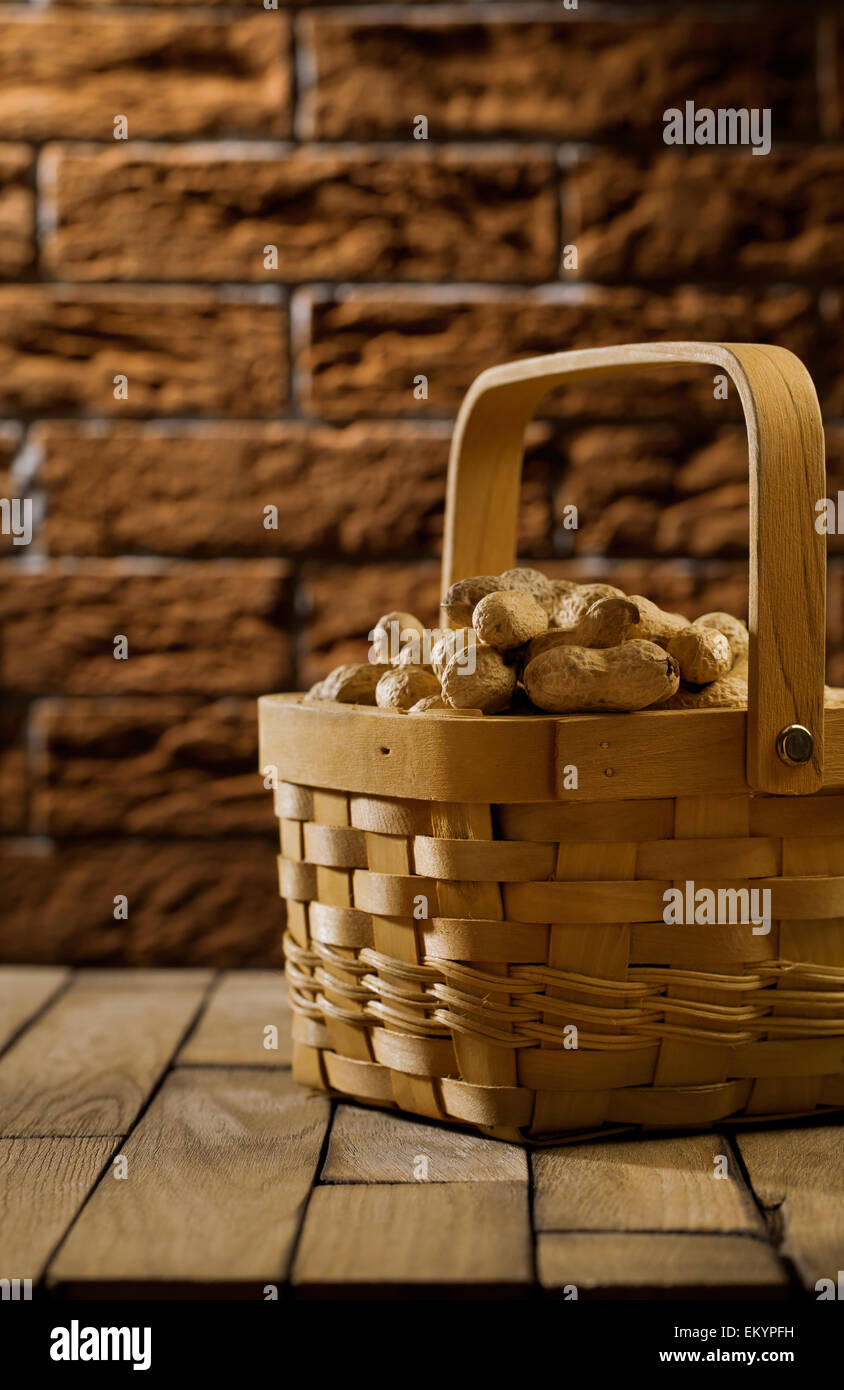 peanuts in wooden basket Stock Photo - Alamy