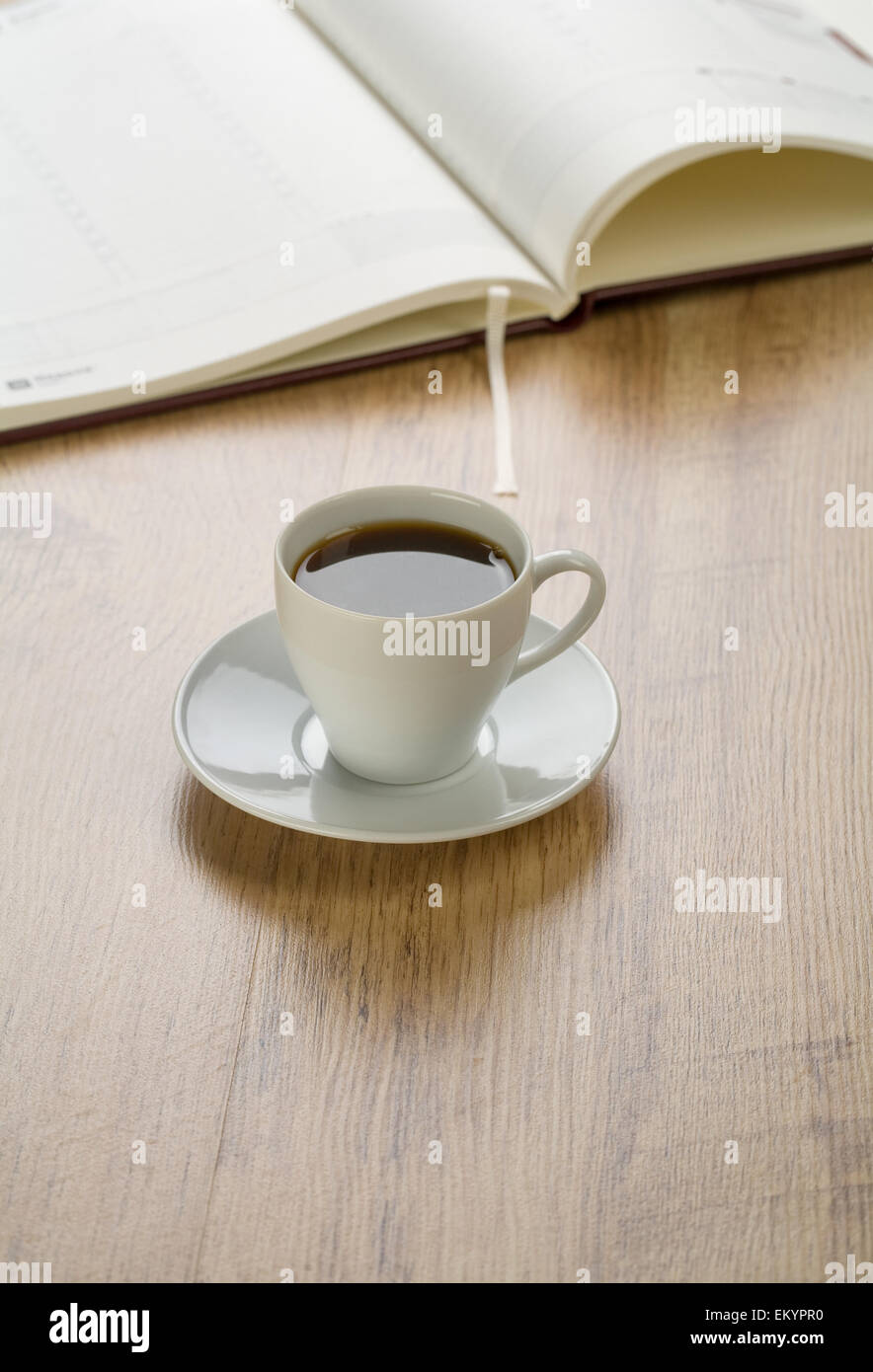 diary with cup of coffee Stock Photo - Alamy