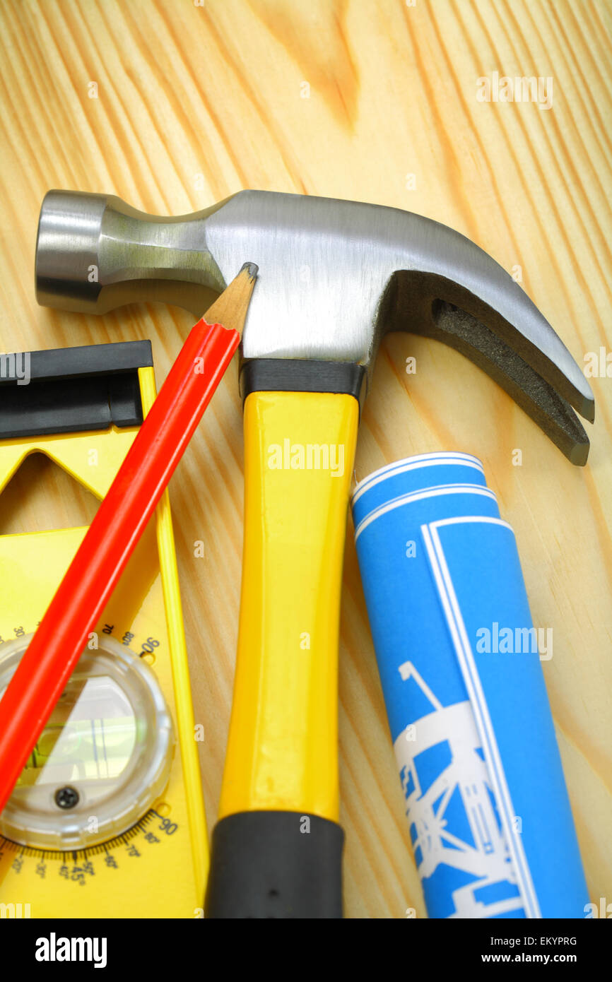 hammer pencil blueprint level on wooden boards Stock Photo - Alamy