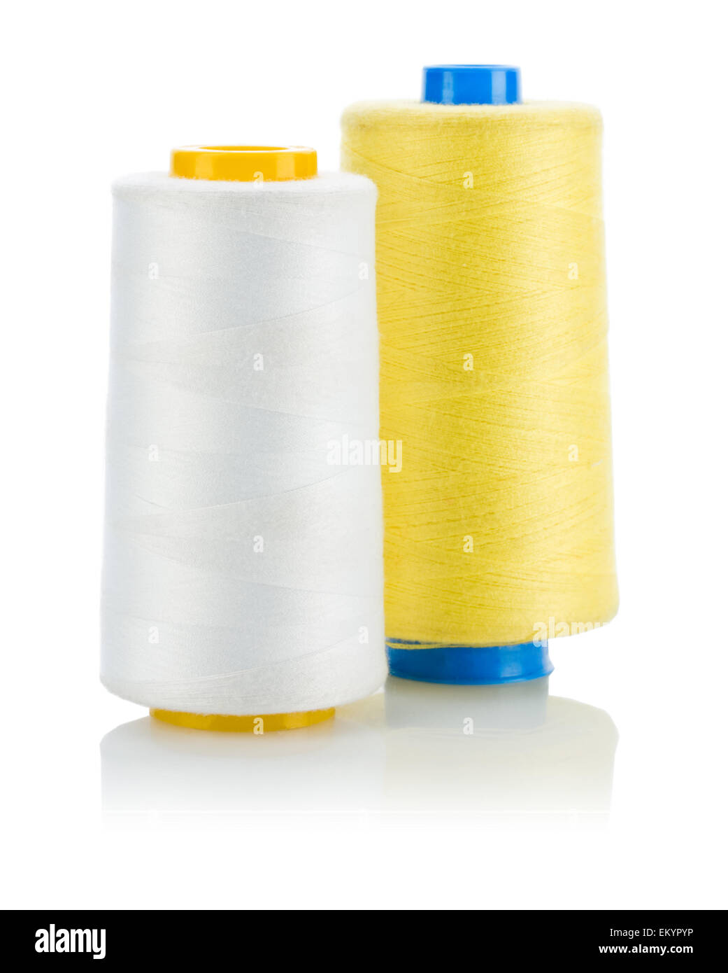 yellow and white thread on spools isolated Stock Photo - Alamy