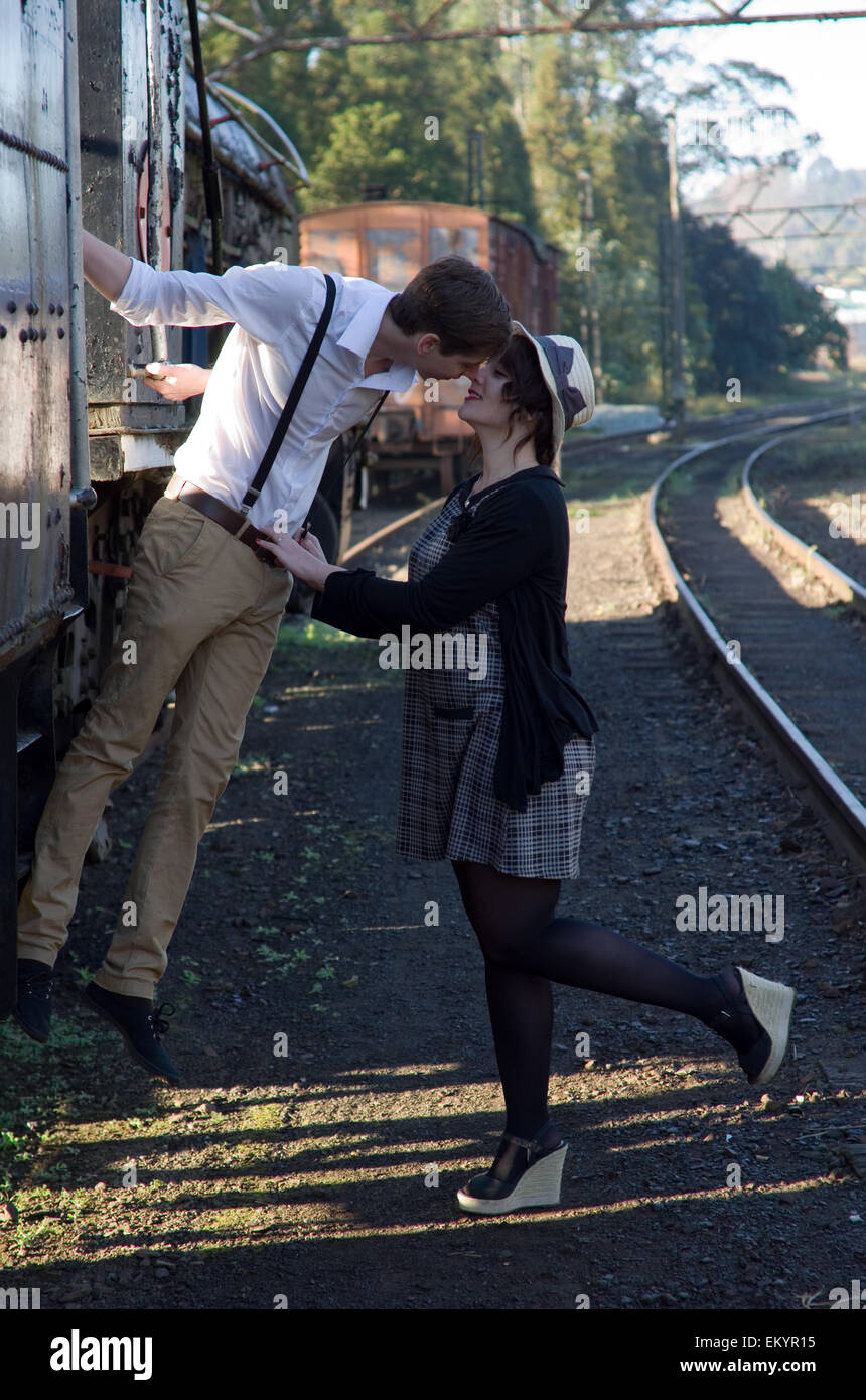 Couple with suitcase vintage hi-res stock photography and images - Alamy