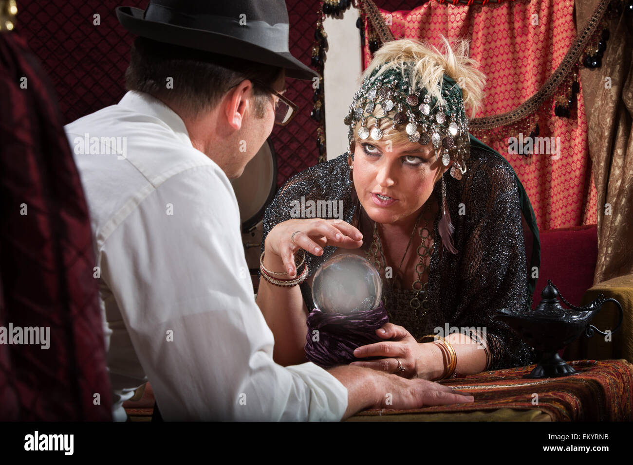Fortune Teller with Crystal Ball Stock Photo - Alamy