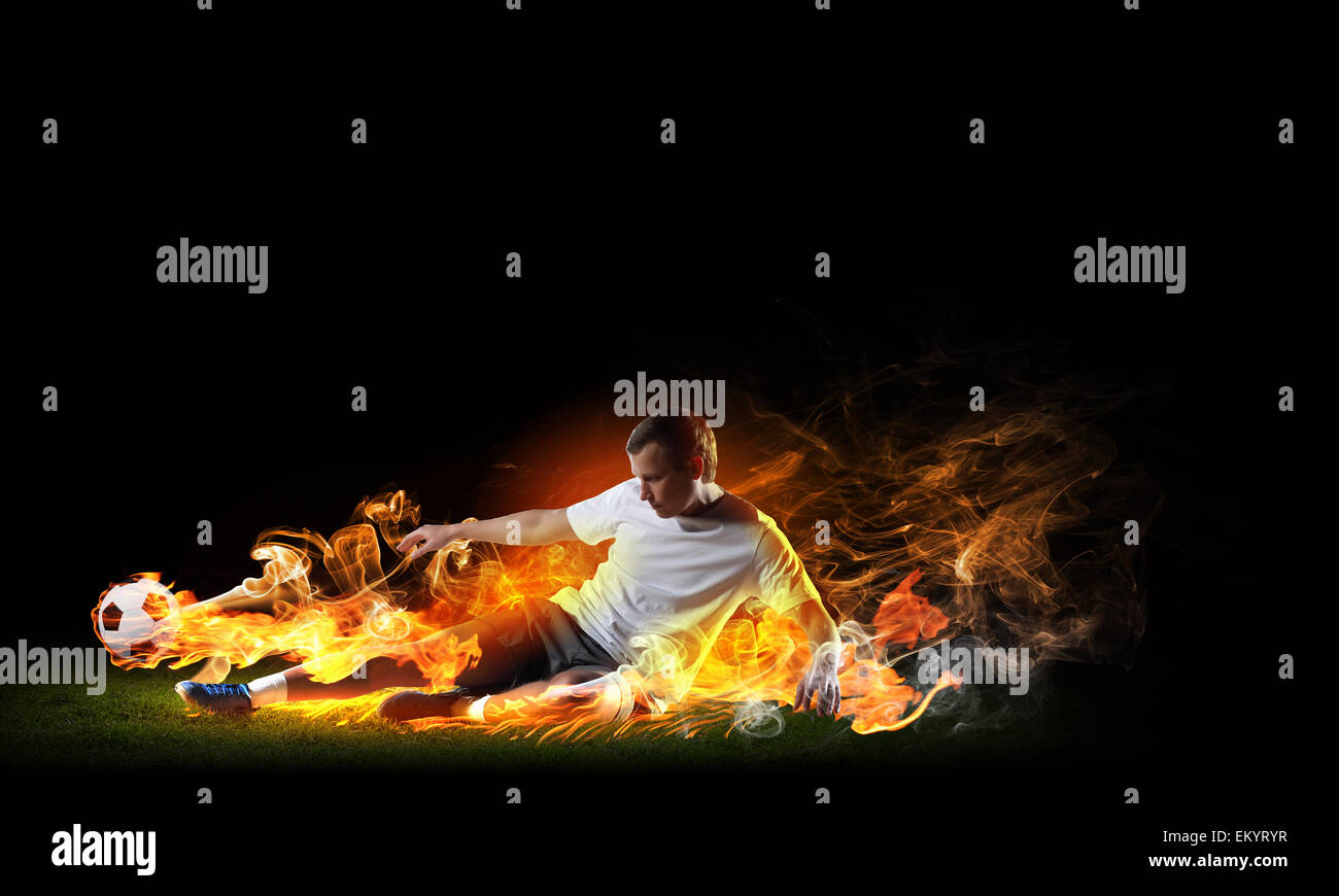 Football player with ball Stock Photo - Alamy