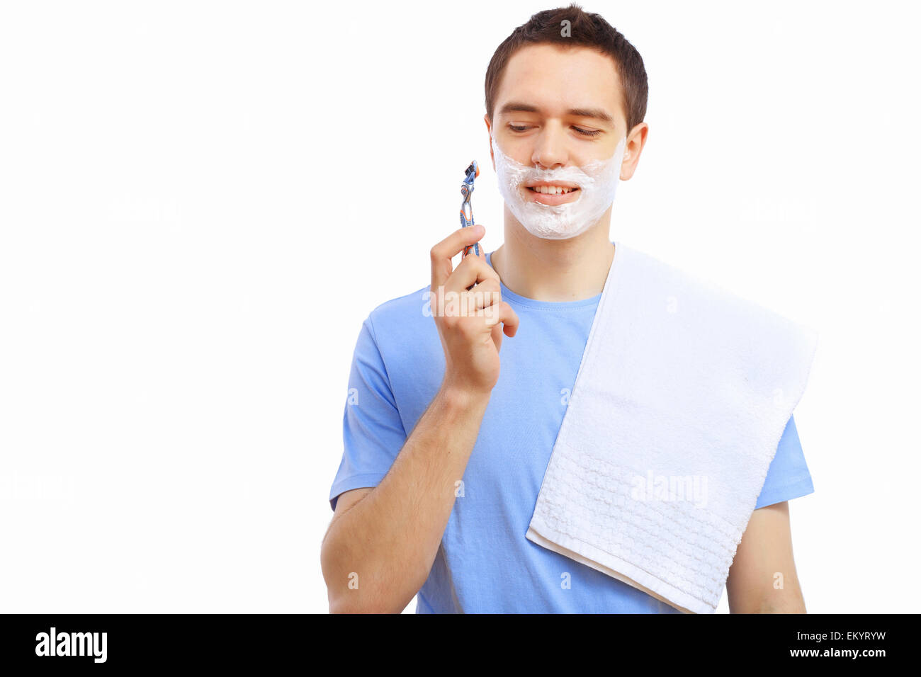 Young man at home shaving himself Stock Photo - Alamy
