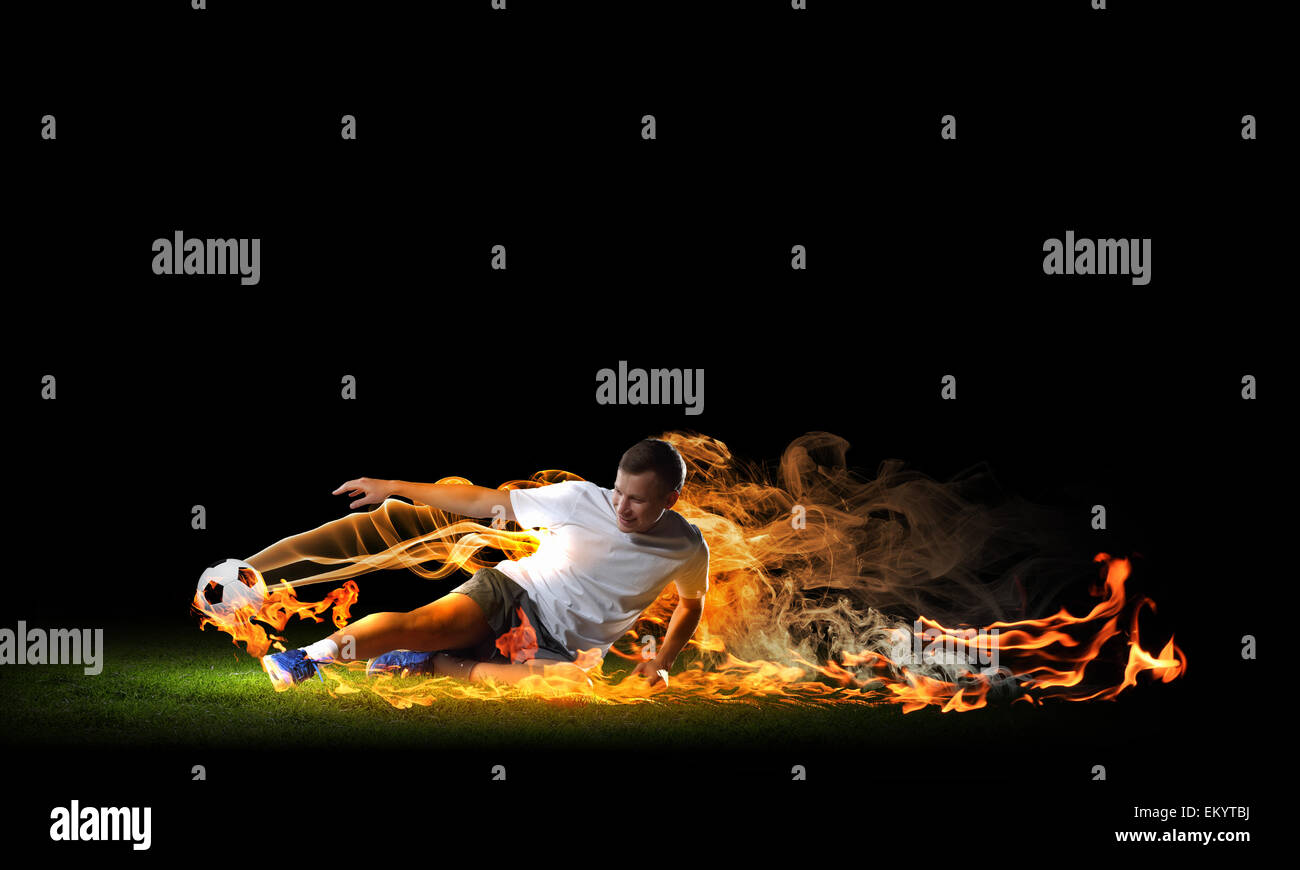 Football player with ball Stock Photo - Alamy