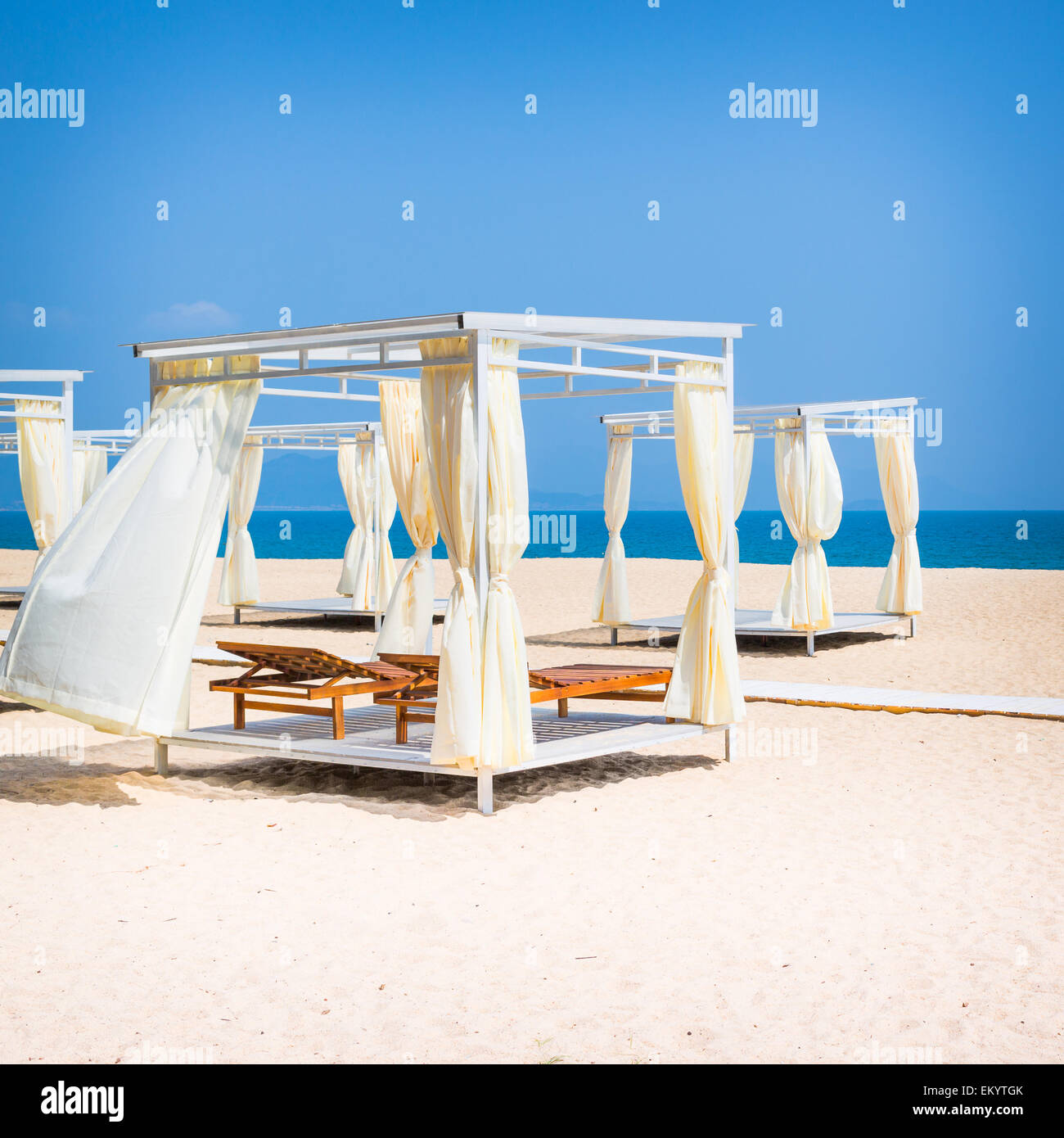 Square gazebo on a tropical beach Stock Photo - Alamy