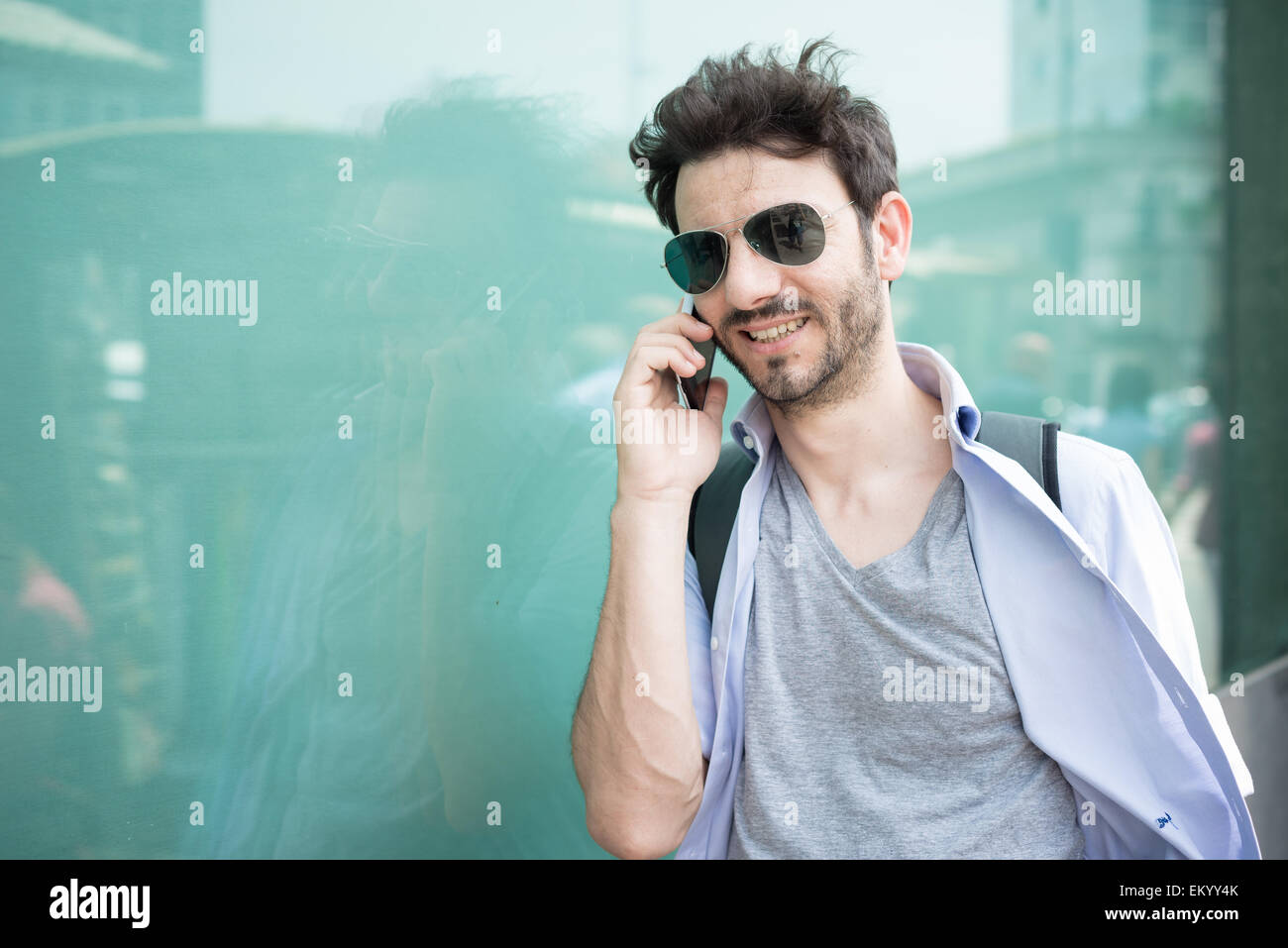 man in the street on the phone Stock Photo - Alamy