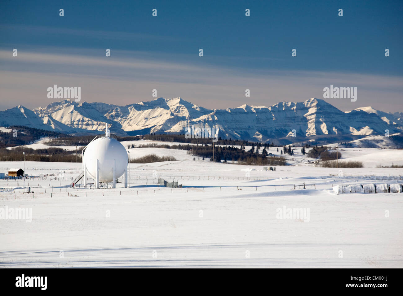 Spherical Oil Tank In A Snow-Covered Field; Longview, Alberta, Canada ...