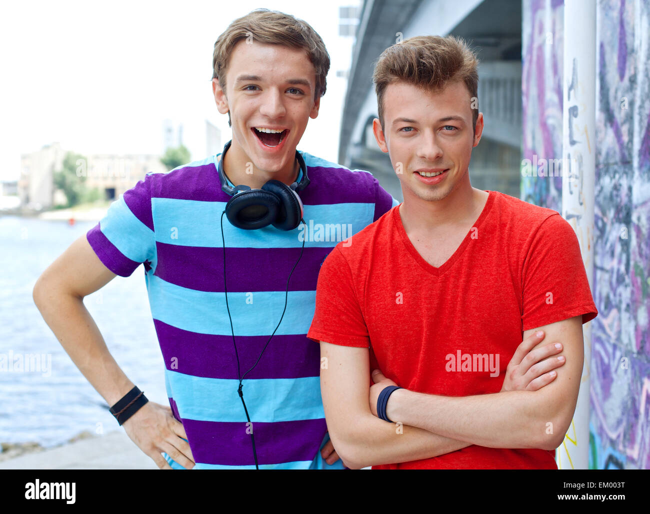 Two young friends happy Stock Photo - Alamy