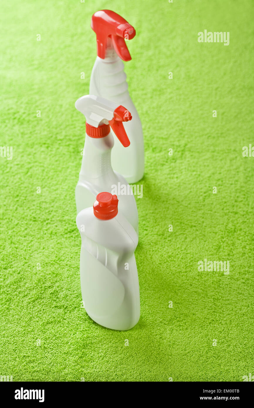 set for cleaning on green background Stock Photo - Alamy