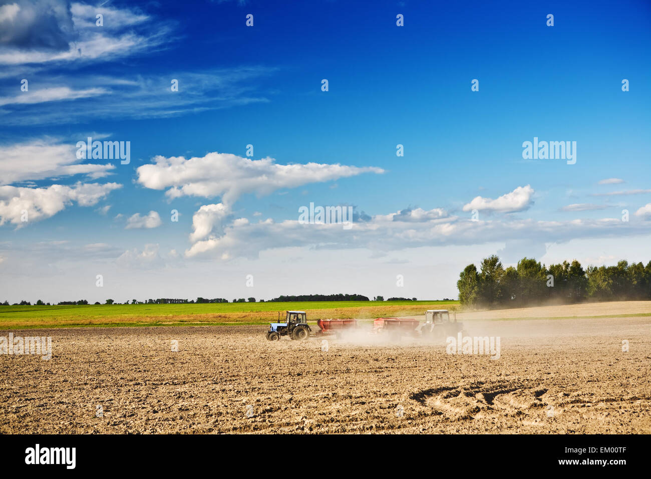 two tractor on the field Stock Photo - Alamy