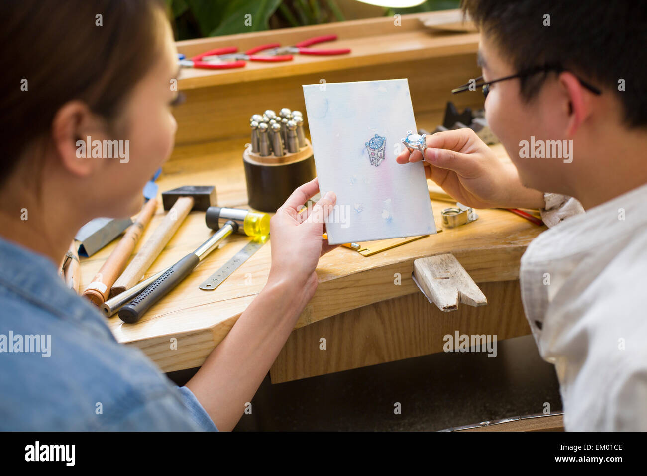 Indian fashion designer making sketch hi-res stock photography and ...