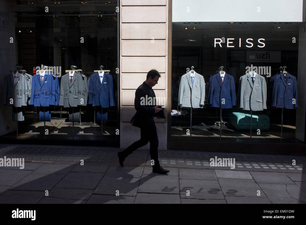 Reiss shop suits on display in a central London window Stock Photo - Alamy