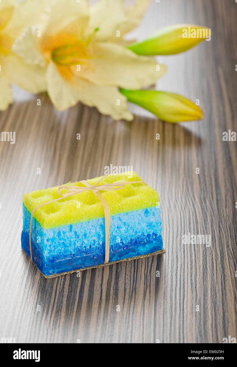 soap bath sponge and flower Stock Photo - Alamy