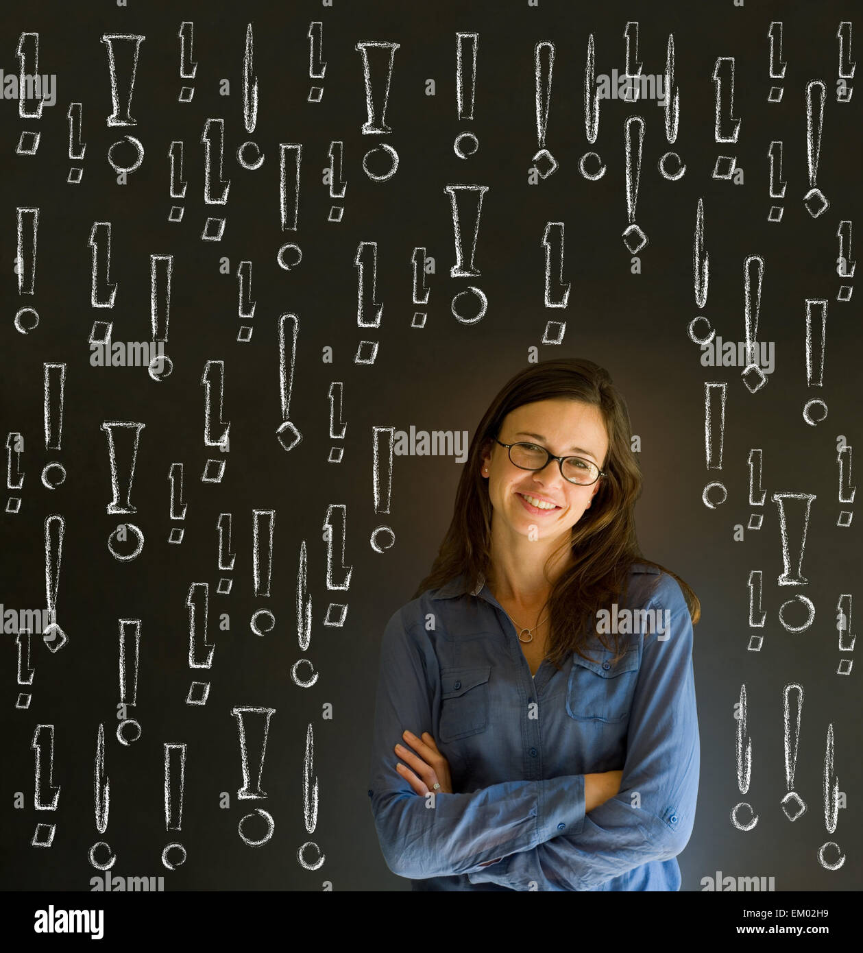 Businesswoman student teacher chalk exclamation marks Stock Photo - Alamy