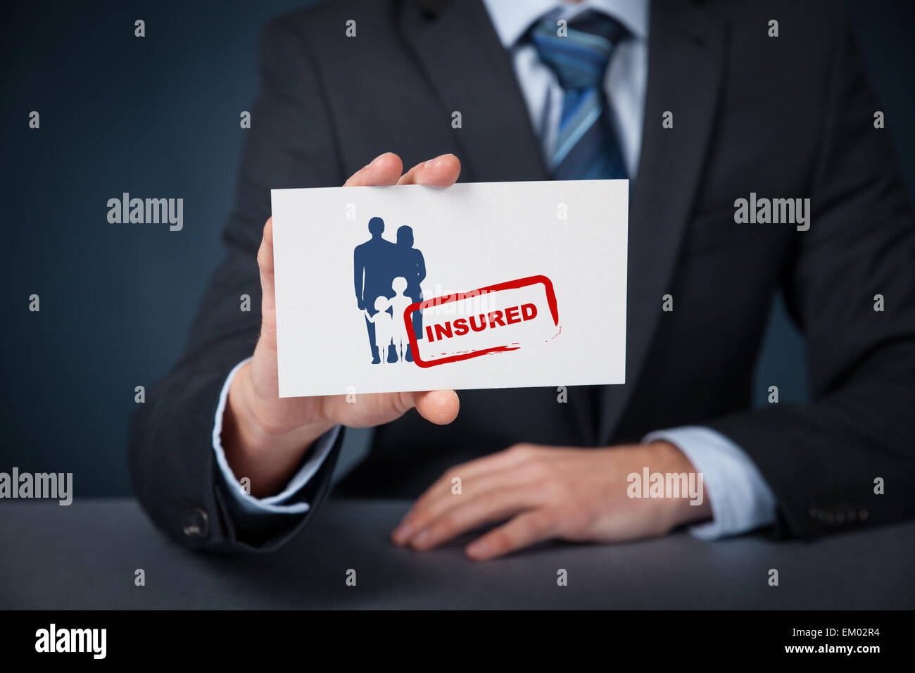 Insured family concept. Insurance agent with family silhouette on card ...