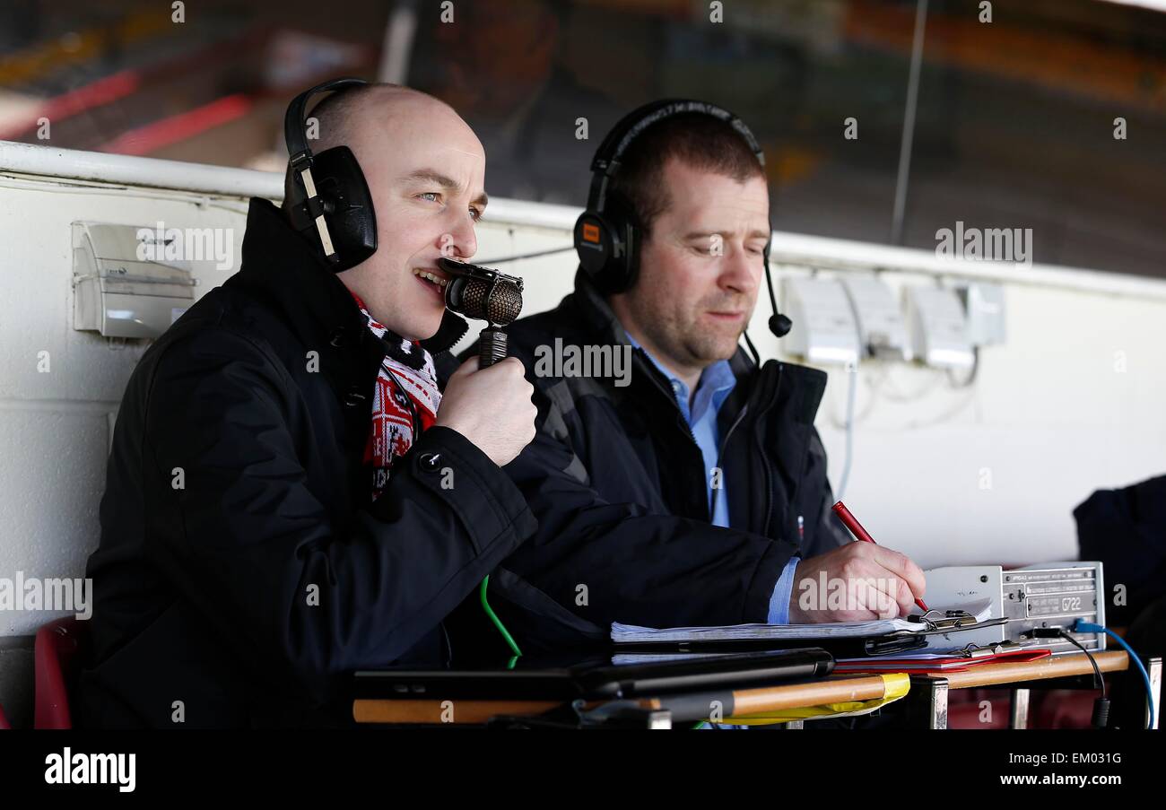Radio journalists broadcasting live during a sports match Stock Photo ...