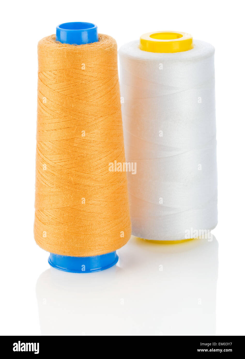 orange and white thread on spools isolated Stock Photo - Alamy