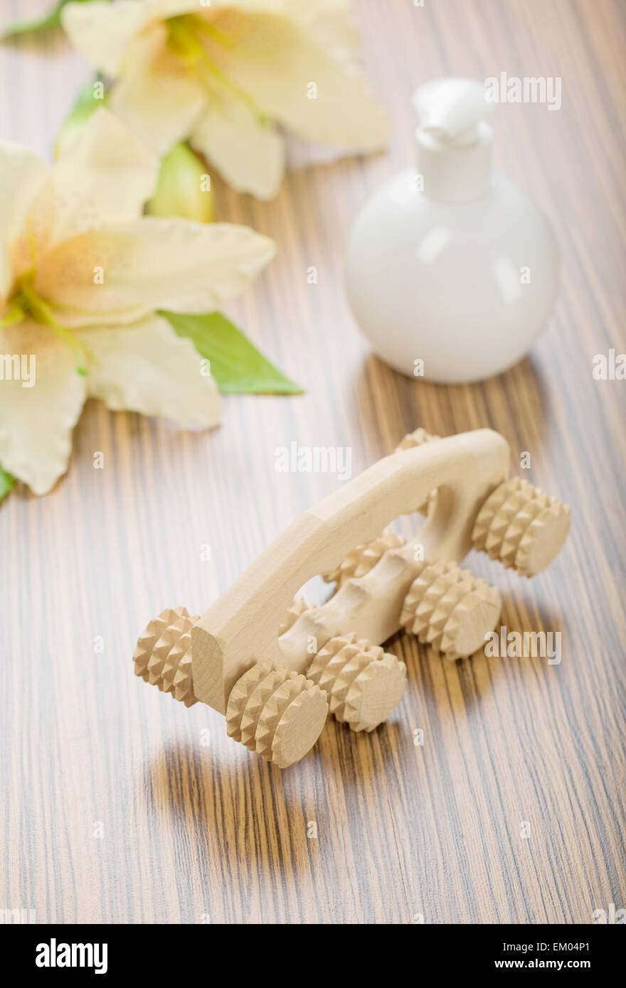 round bottle massager and flower Stock Photo - Alamy