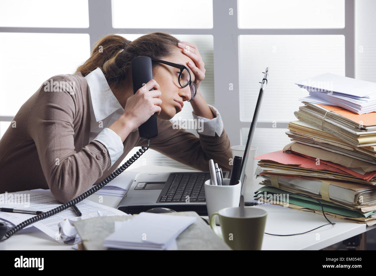 Secretary bad day Stock Photo - Alamy