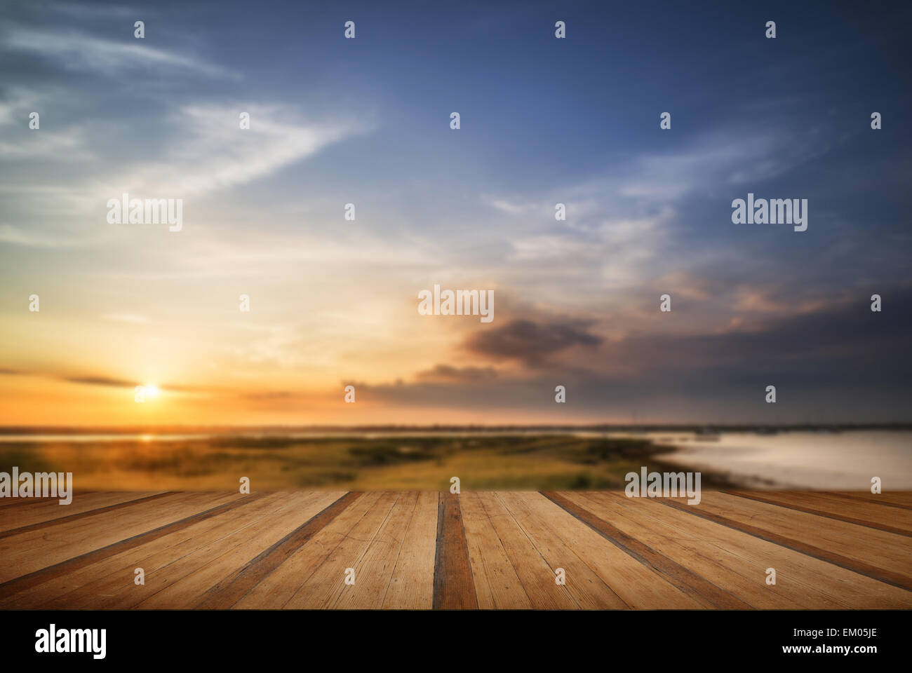 Beautiful Summer sunset landscape over wetlands and harbour with wooden ...