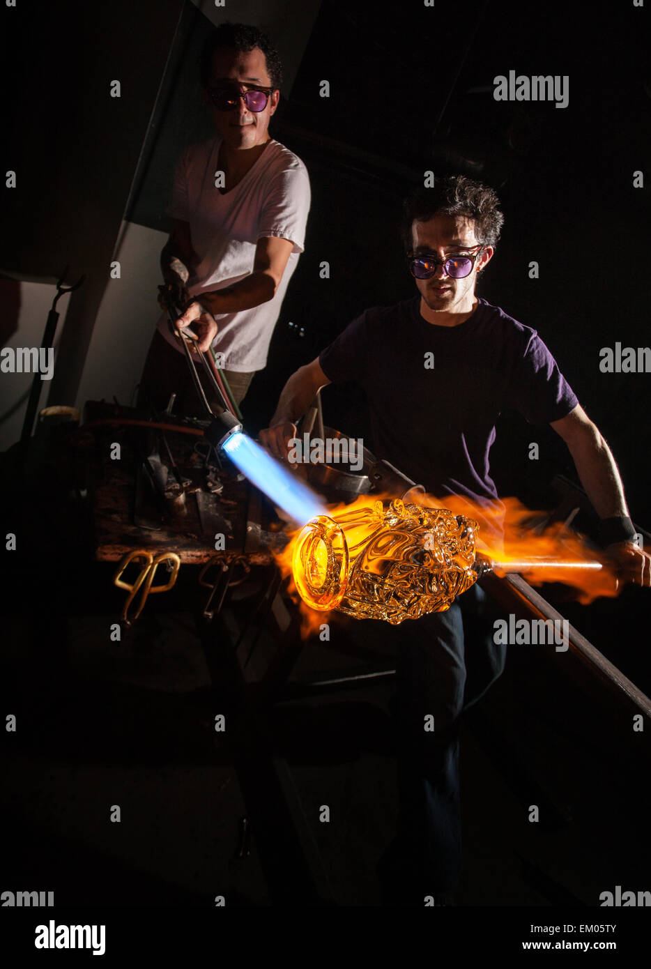 Men Forming Glass Art Stock Photo - Alamy