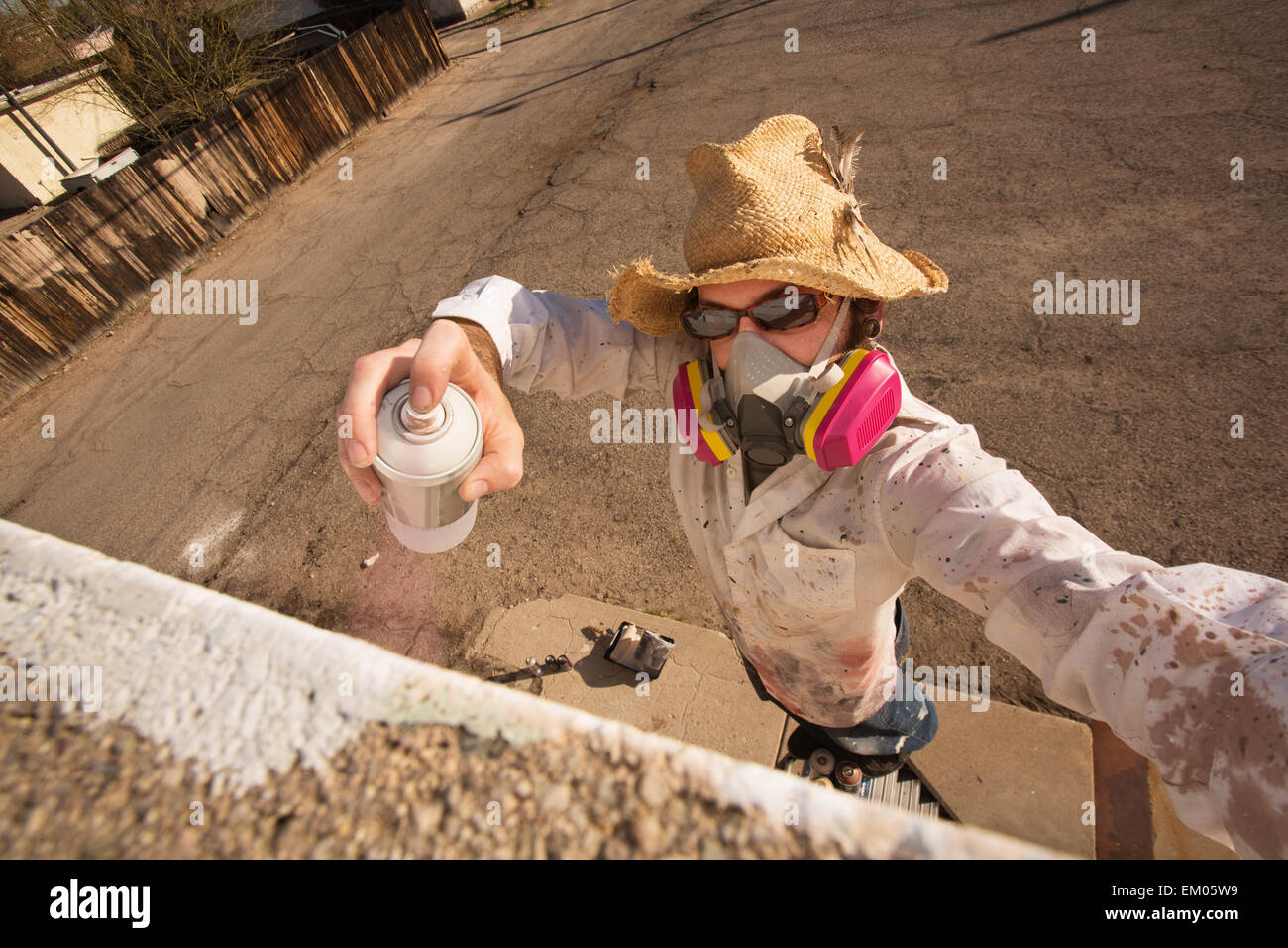 Graffiti Artist Defacing Wall Stock Photo - Alamy
