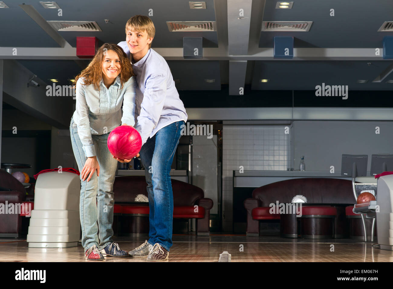 Couple bowling together hi-res stock photography and images - Alamy