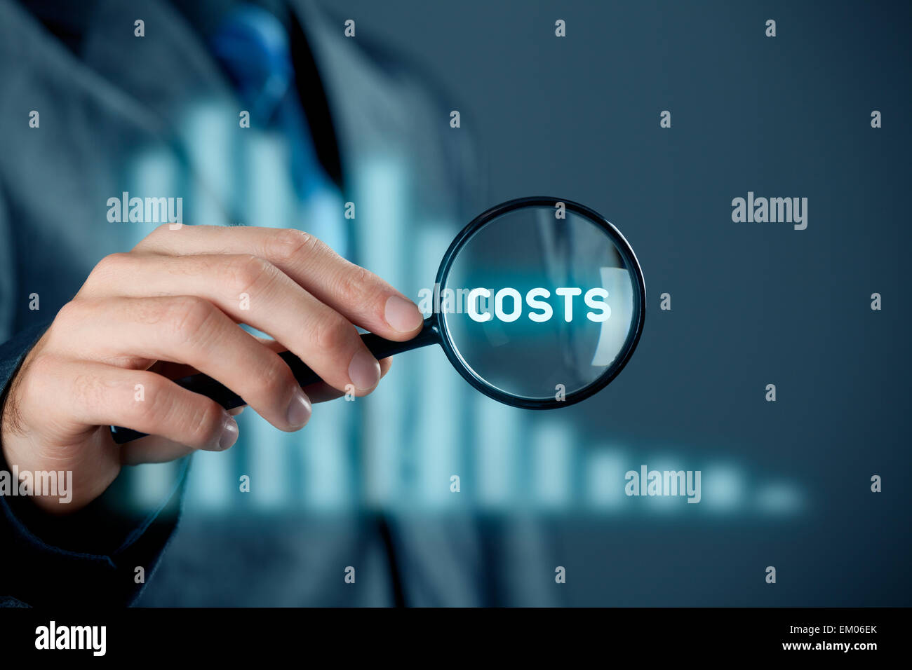 Focus on decrease (cut) costs concept. Businessman with magnifying ...