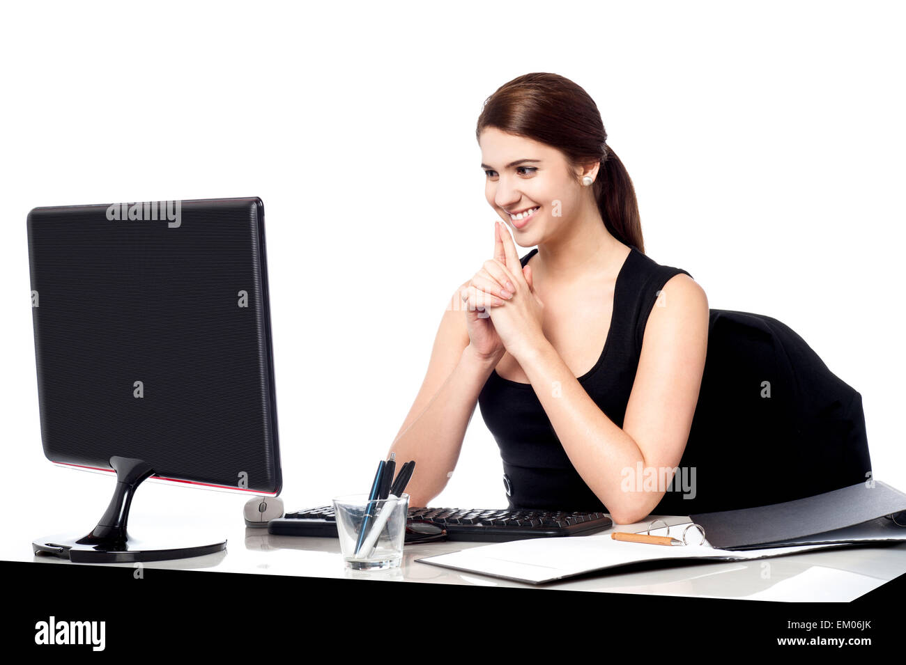 Smiling corporate lady in her office Stock Photo - Alamy