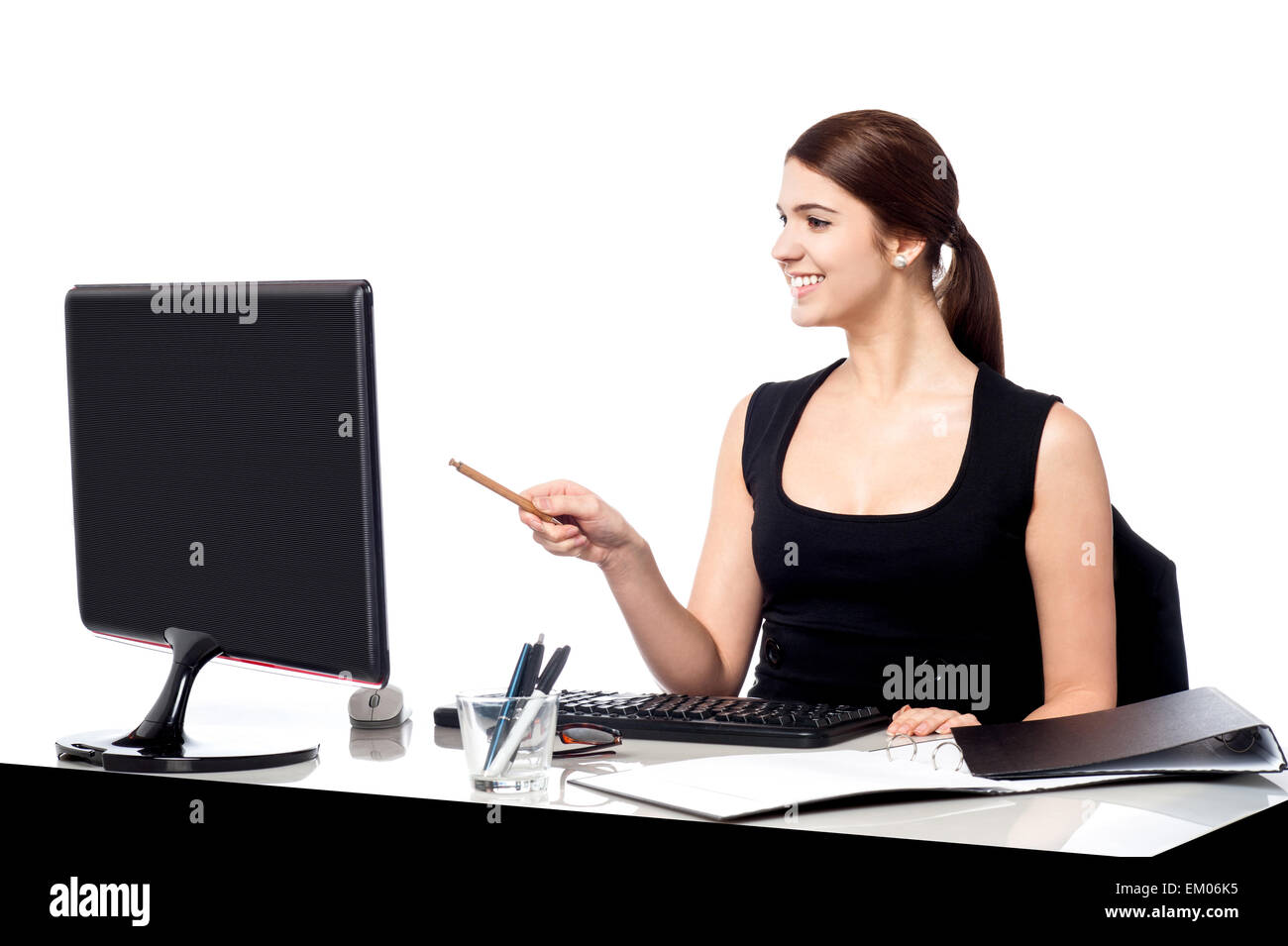 Female assistant at her work desk Stock Photo - Alamy