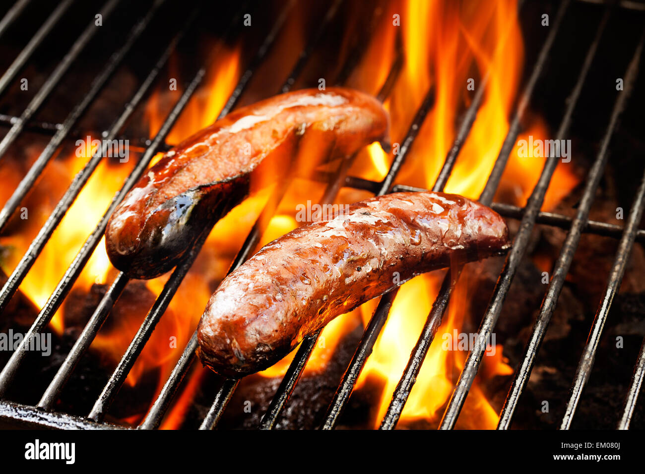 Sausages On The Grill Stock Photo - Alamy