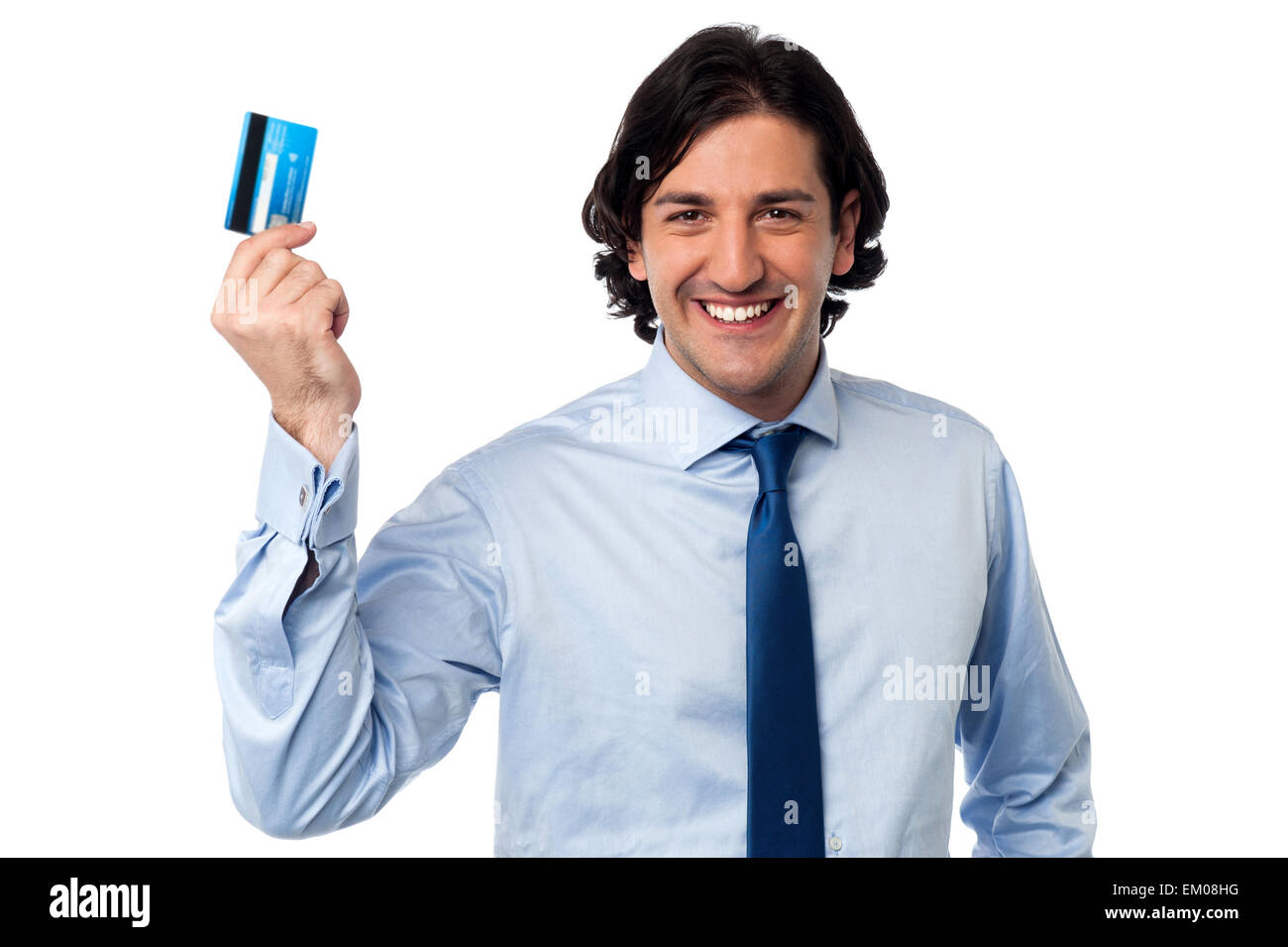 Businessman holding up his credit card Stock Photo - Alamy