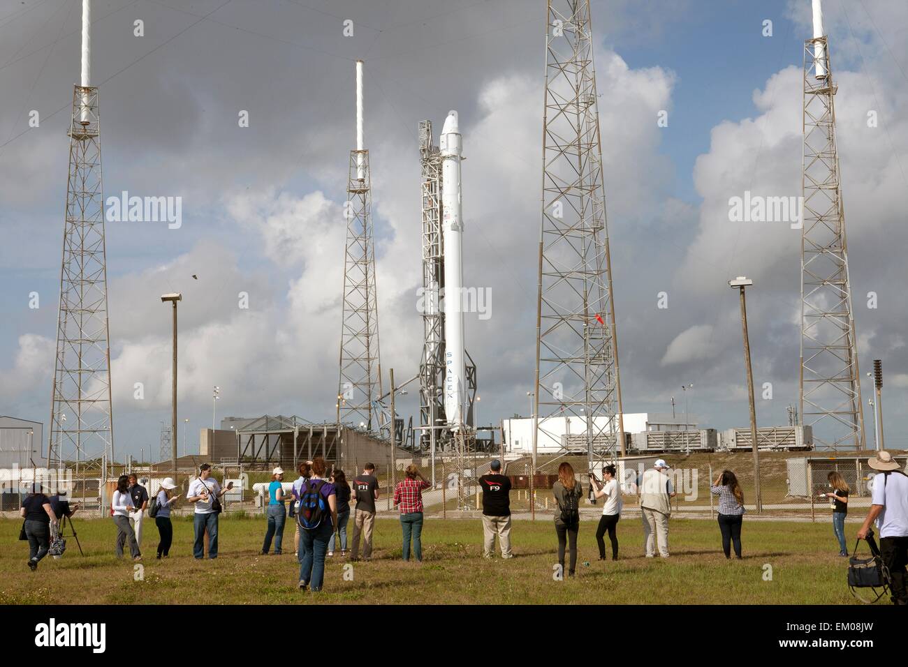 The SpaceX Falcon 9 commercial rocket prepares to boost a Dragon ...