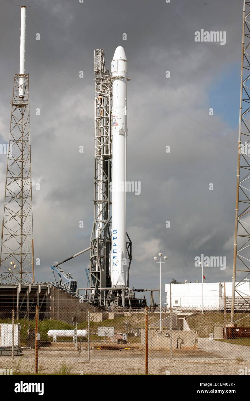 The SpaceX Falcon 9 commercial rocket prepares to boost a Dragon ...