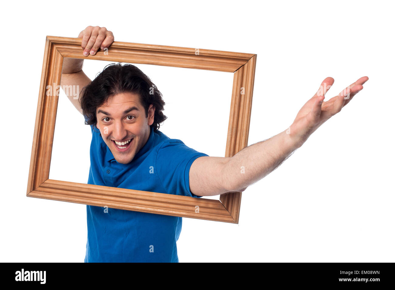 Creative young man holding Cut Out Stock Images & Pictures - Alamy