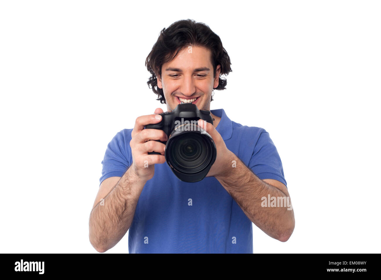 Man looking at pictures stored in camera Stock Photo - Alamy