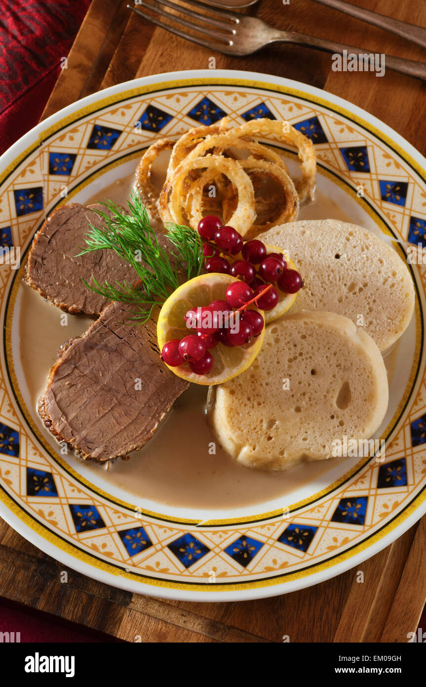 Svíčková na smetaně. Beef in cream sauce with bread dumplings. Czech ...