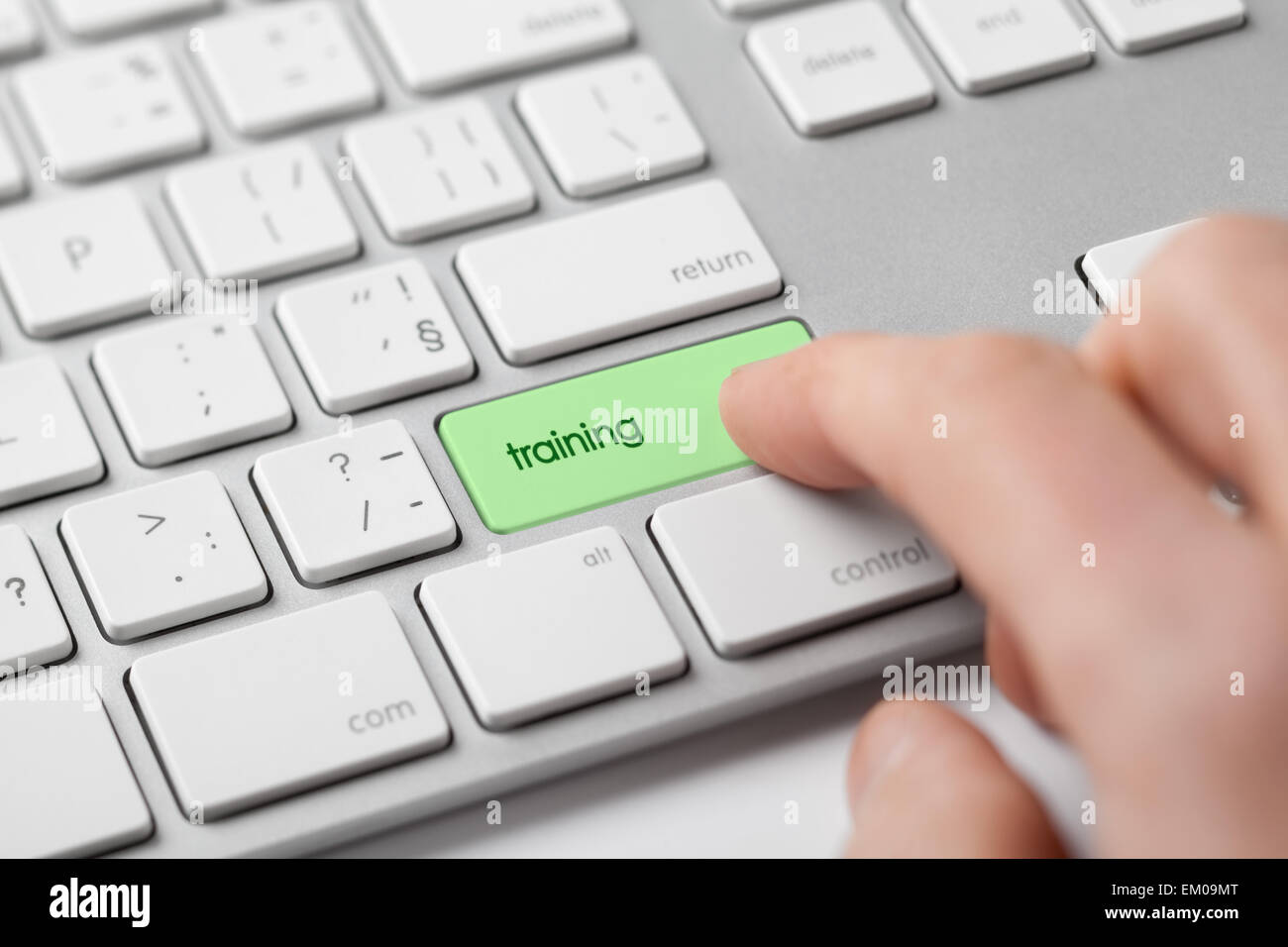 Internet training concept. Man click on keypad with text training Stock ...