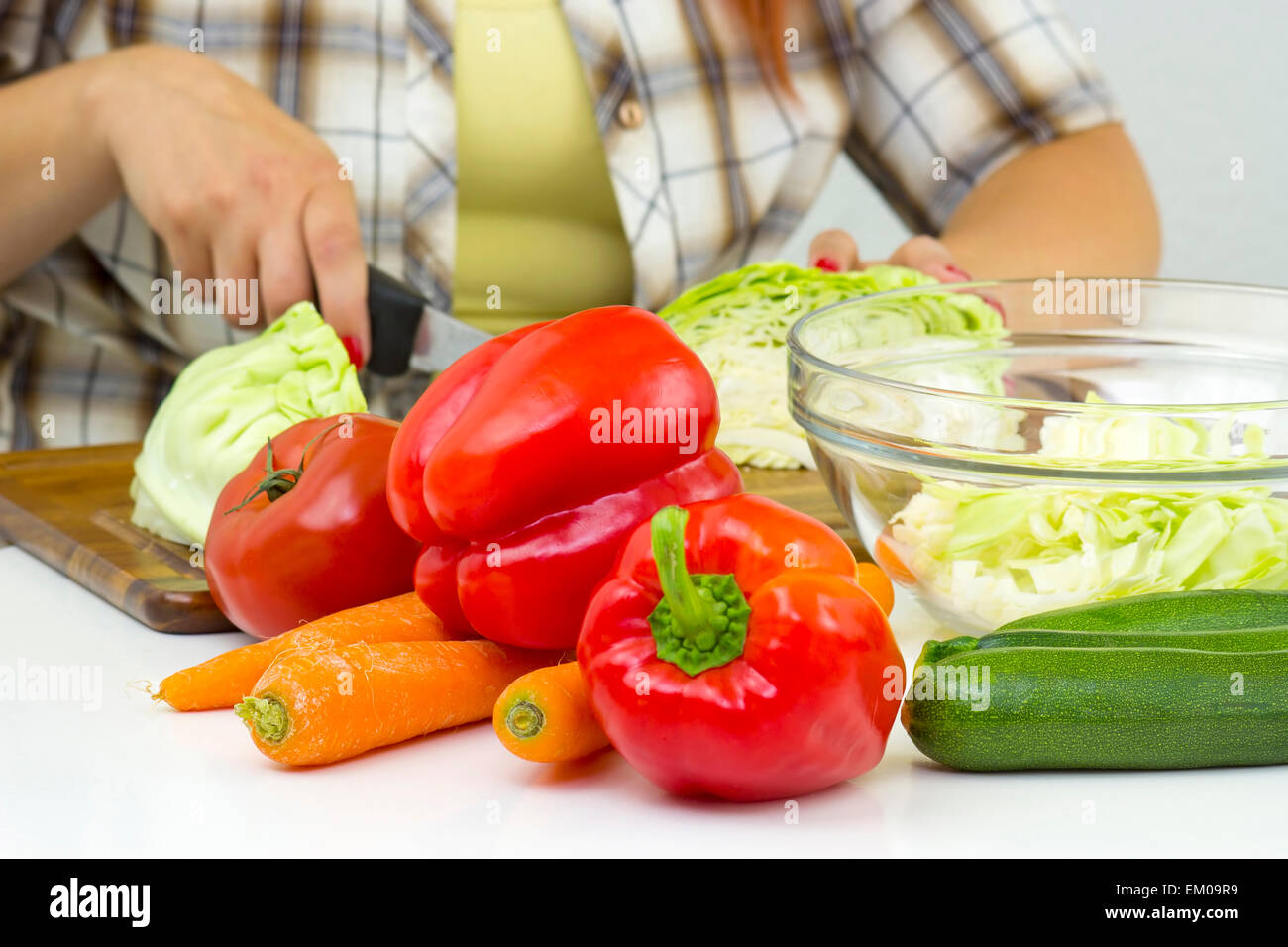 woman cutting vegetables Stock Photo - Alamy
