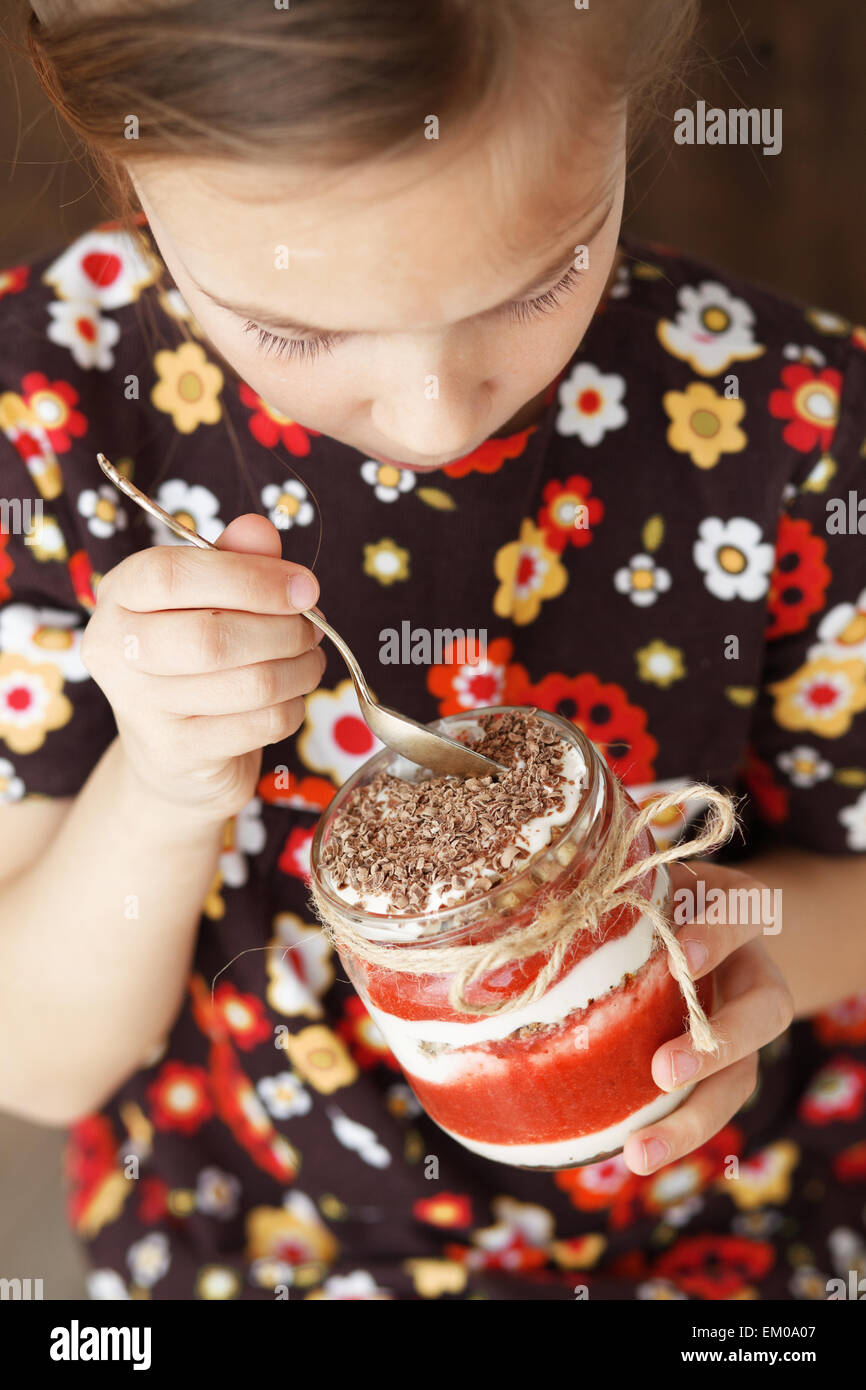 Child eating dessert Stock Photo - Alamy