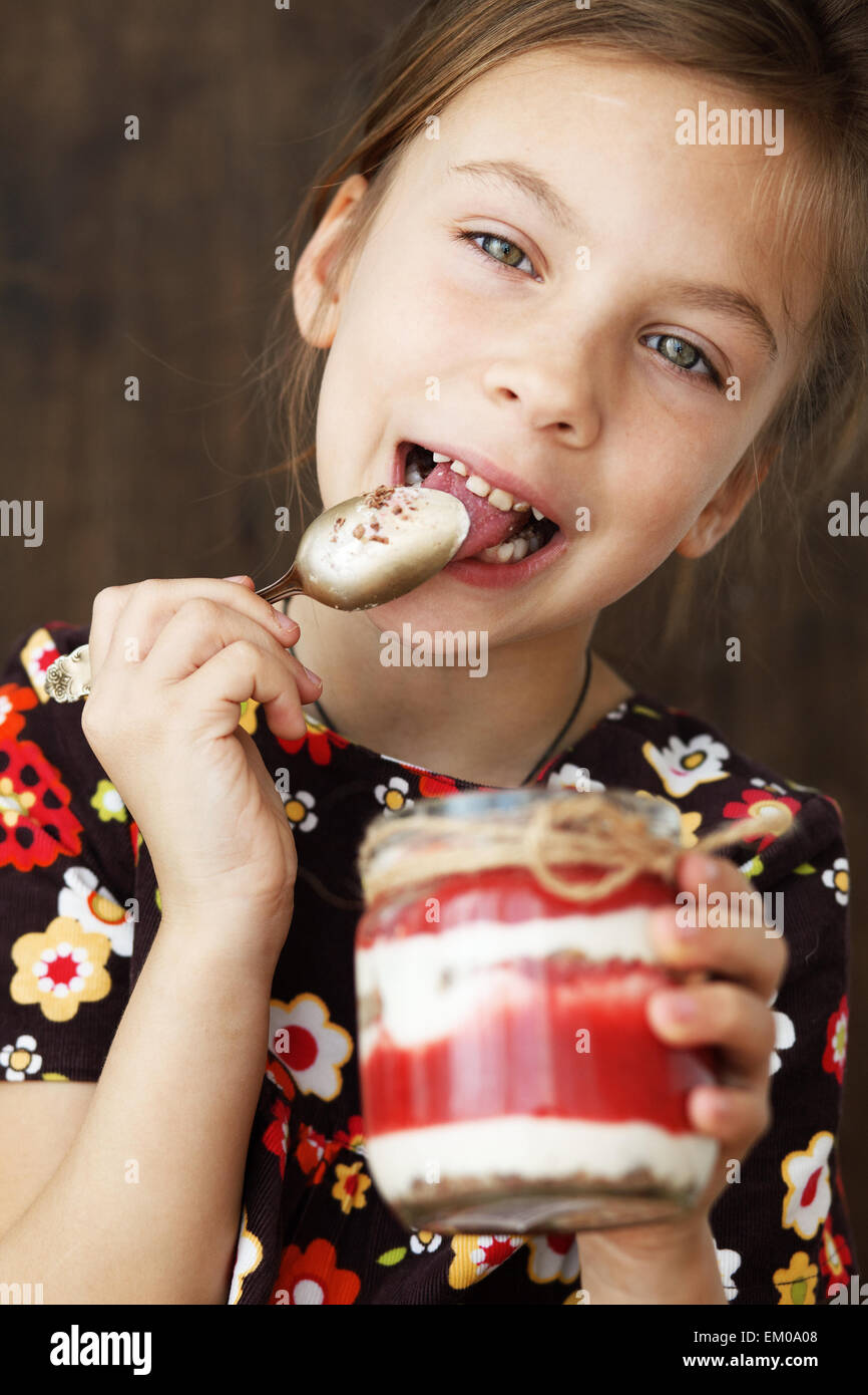 Child eating dessert Stock Photo - Alamy